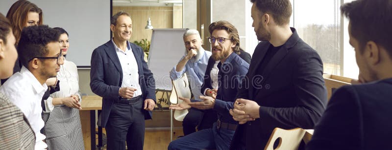 Team of Smart Business People Have Fun Talking and Discussing Work ... Team of Smart Business People Have Fun Talking and Discussing Work ...