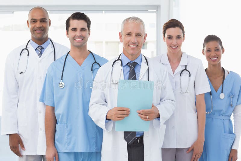 Team of Smiling Doctors Looking at Camera Stock Image - Image of female ...