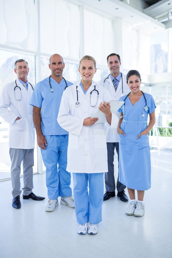 Team of Smiling Doctors Looking at Camera Stock Image - Image of clinic ...