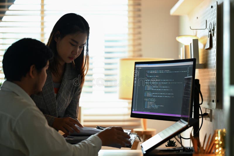 Team of Software Development Brainstorming, Working with Coded Data in Corporate Office ...