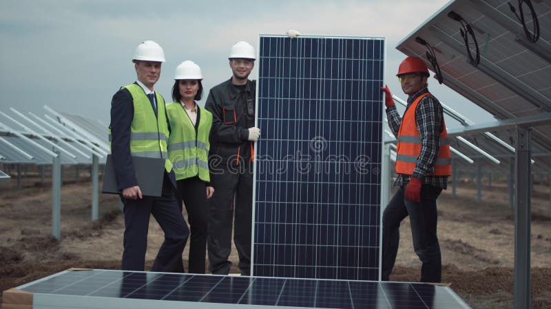 Team with solar panel stock photo. Image of showing, engineer - 91705924