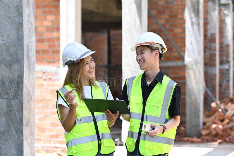 Team of Specialists Discussing Planning and Development Details while ...