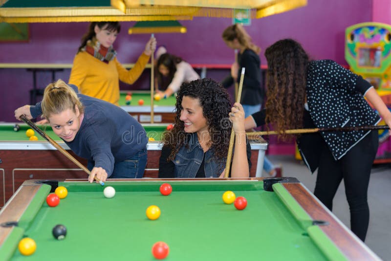 Team Standing at Pool Table Stock Photo - Image of smile, friends ...