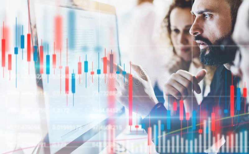 Team of Stock Traiders Sitting Front of Computer with Technical Price ...