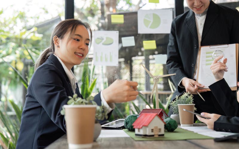 Team Strategy and Sustainable Innovations. Professionals Working ...