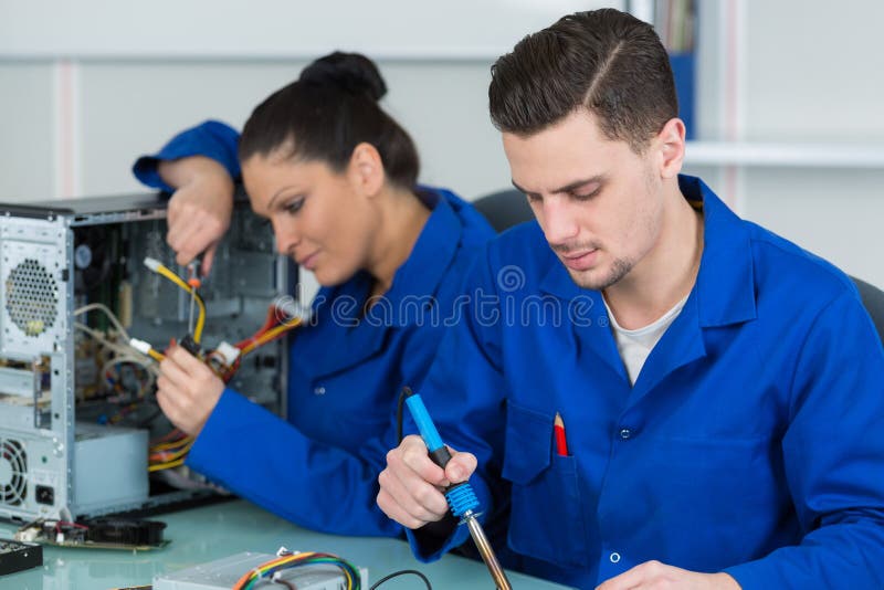 Team Students Examining and Repairing Computer Parts Stock Image ...