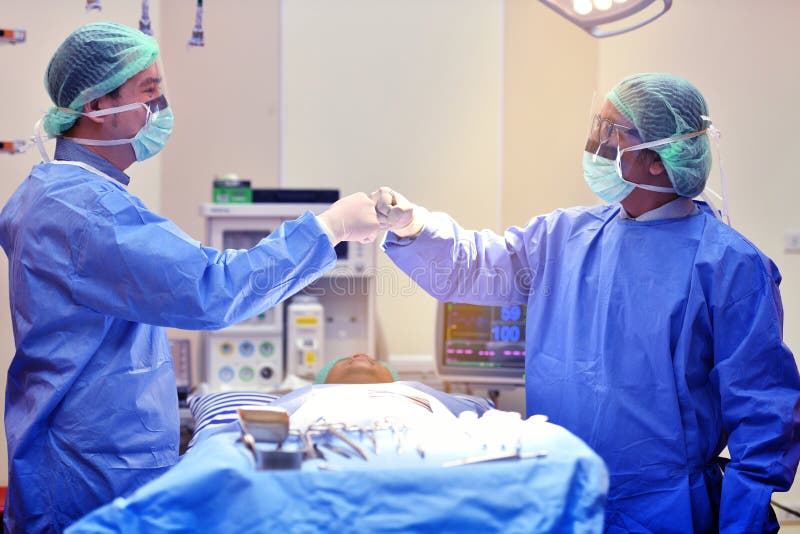 Team Surgeon Congratulating a Successful Operation Stock Photo - Image ...