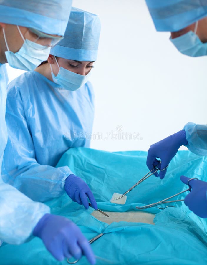 Team of Surgeon in Uniform Perform Operation on a Stock Image - Image ...