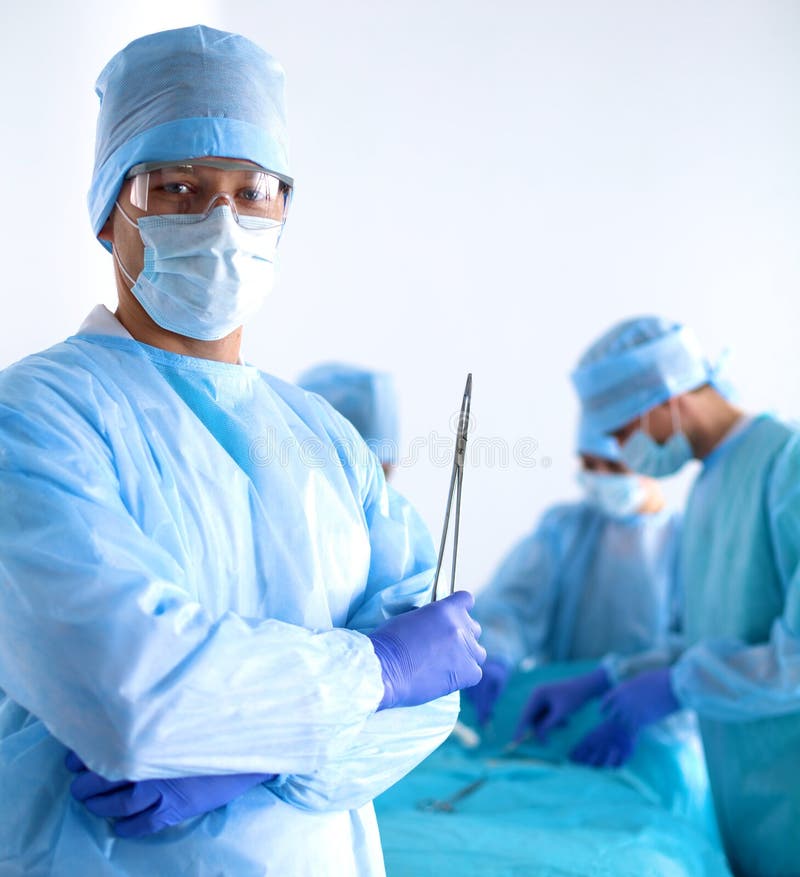 Team of Surgeon in Uniform Perform Operation on a Stock Image - Image ...