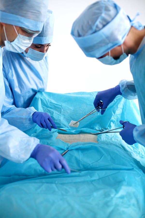 Team Surgeon at Work in Operating Room Stock Photo - Image of people ...
