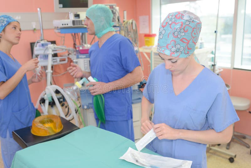 Team Surgeons in Dark Operating Room Stock Image - Image of close ...