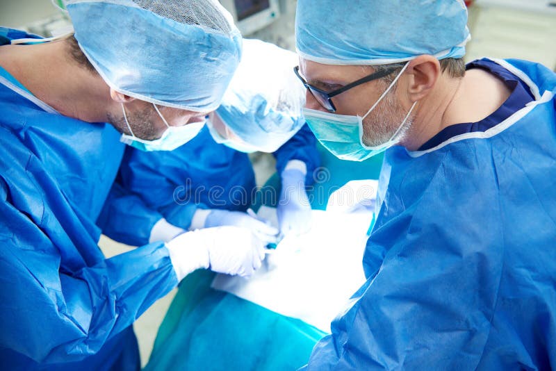The team of surgeons stock photo. Image of glove, cooperation - 87591630