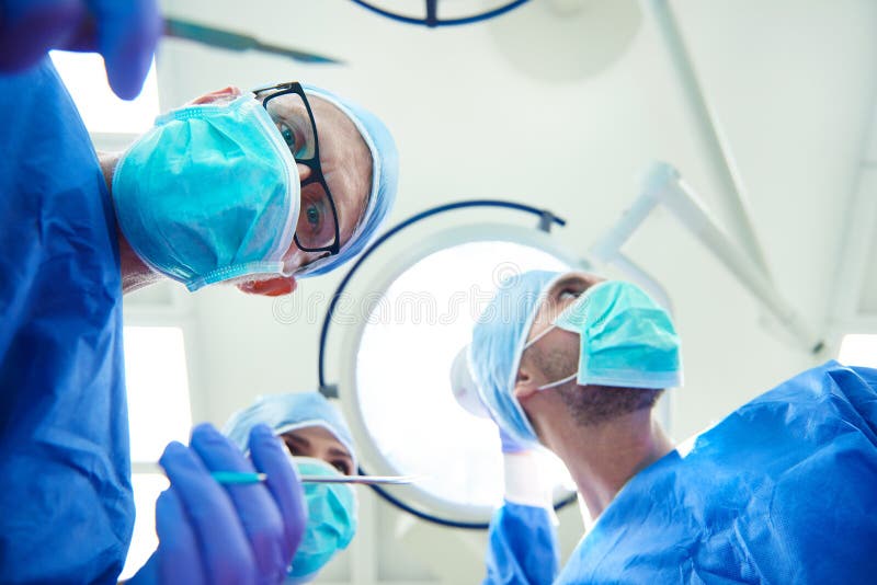 Surgery team stock image. Image of helping, operating - 46799195