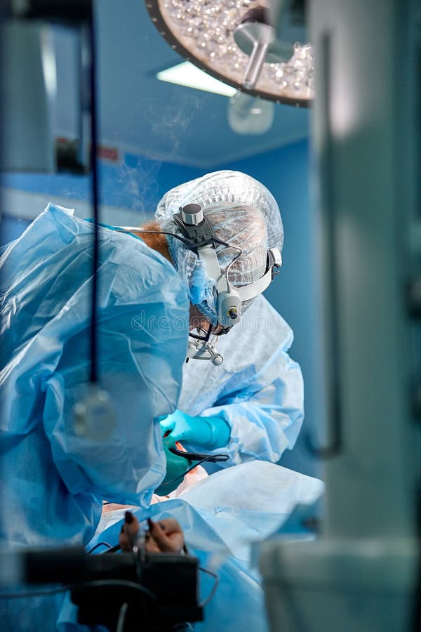 Team of Surgeons Makes an Invasive Operation. Portrait of Surgeons ...
