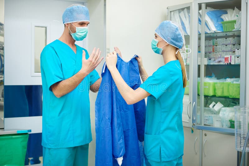 The team of surgeons stock photo. Image of dressed, work - 87592398