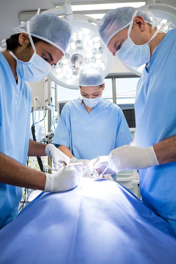 Surgeons Operating in Operation Theater Stock Image - Image of middle ...