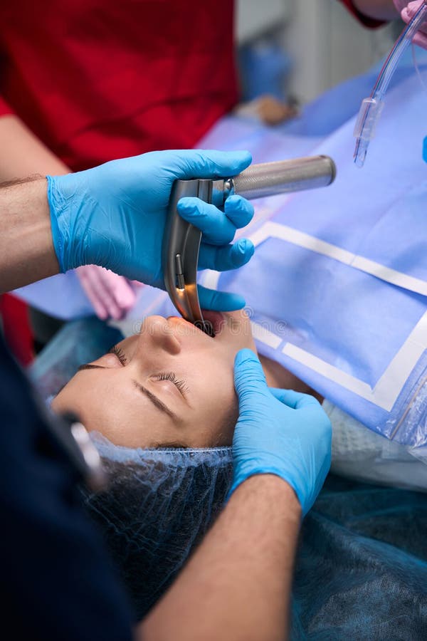 Team of Surgeons Performs Intubation in an Operating Room Stock Image ...