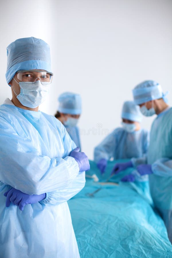 A Team of Surgeons at Work in the Operating Room Stock Image - Image of ...