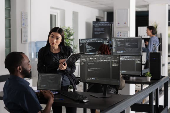 Team of System Engineers Working on Software Development with Source Code Stock Photo - Image of ...