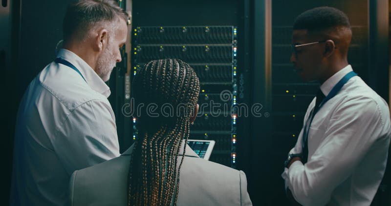 Team Tablet Coding And Server Room For Planning Digital Screen Programming Or Cloud Computing
