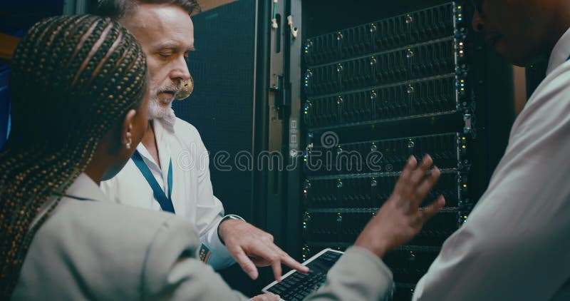 Team Tablet Coding And Server Room For Planning Digital Screen Programming Or Cloud Computing