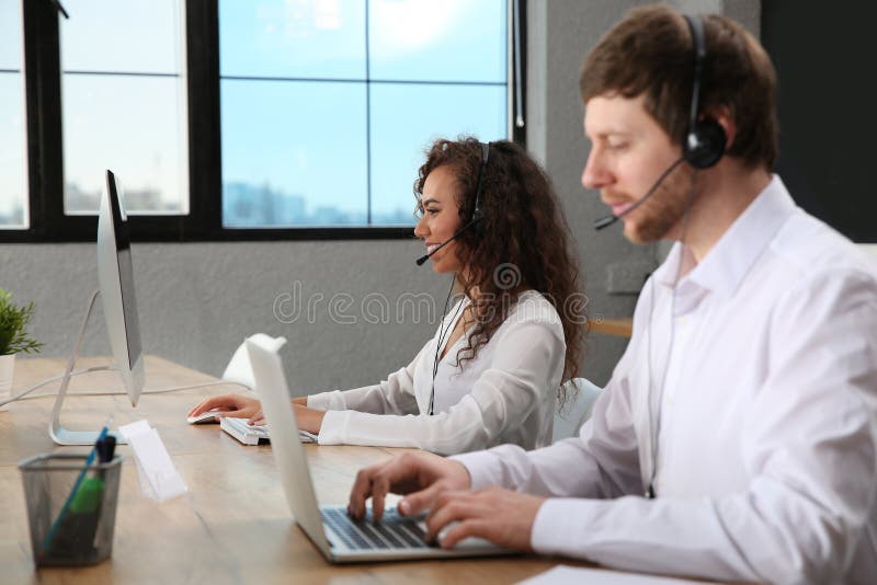 Team of Technical Support with Headsets Stock Photo - Image of ...