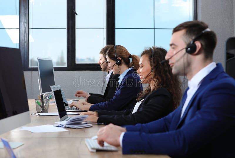 Team of Technical Support with Headsets Stock Photo - Image of device ...