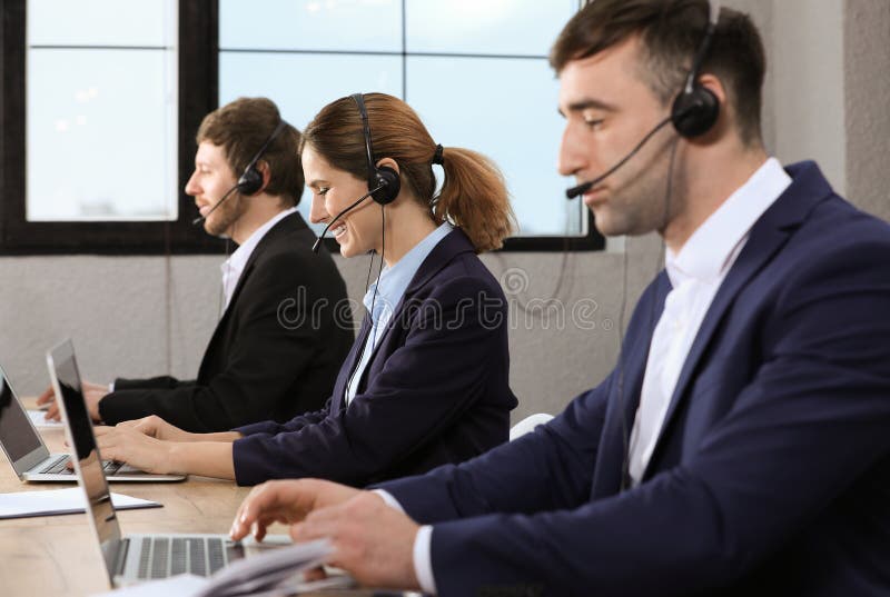 Team of Technical Support with Headsets Stock Photo - Image of device ...