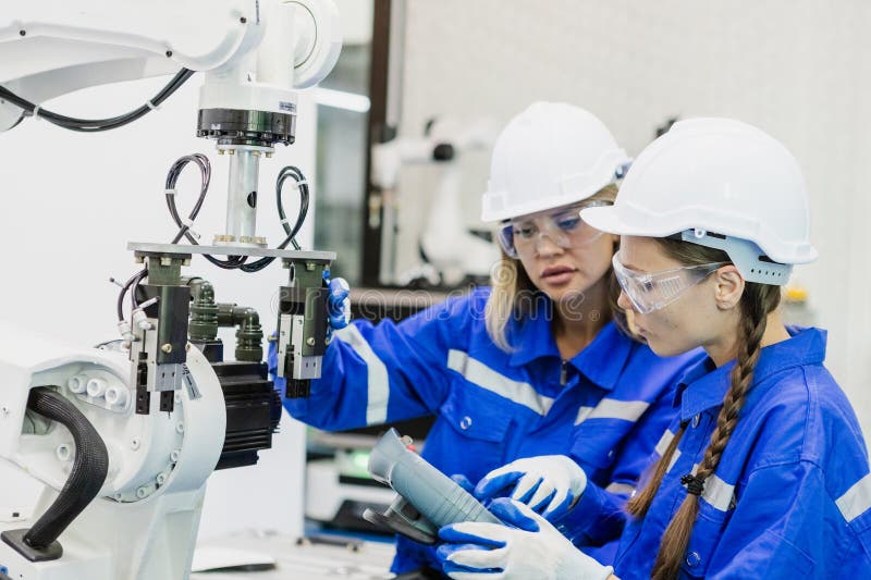 Team Technician Engineer Using Remote Control Automation Robotics at ...