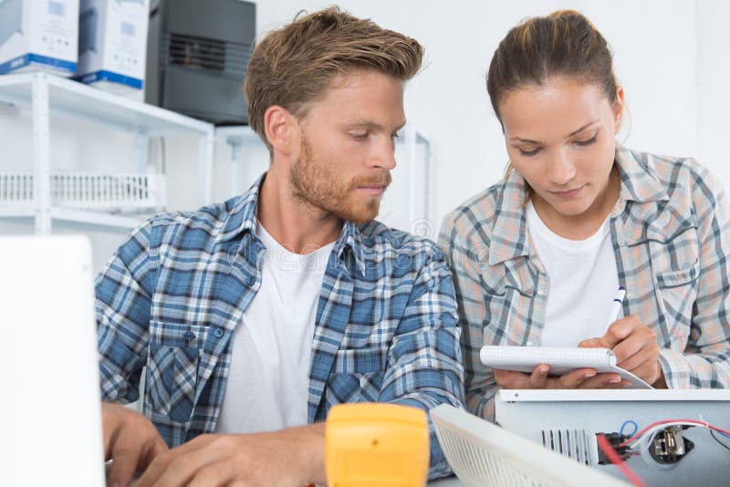 Team Technicians Working Together Stock Photo - Image of tech ...