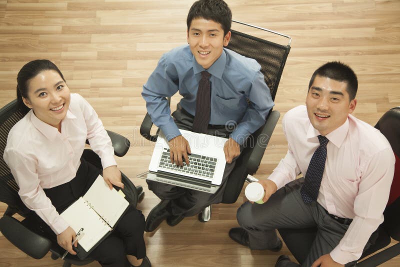 Team of Three People Working on the Project and Sitting Together ...