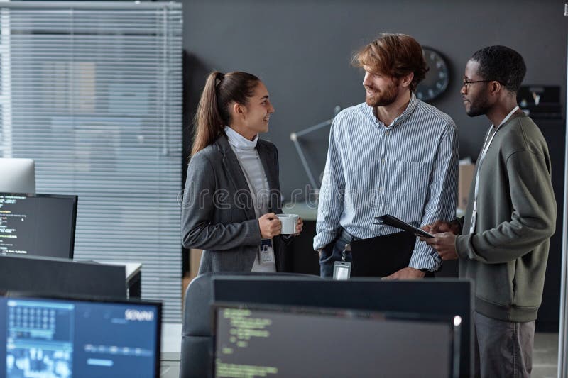Team of Three Young People Standing in Formal Office Stock Image ...