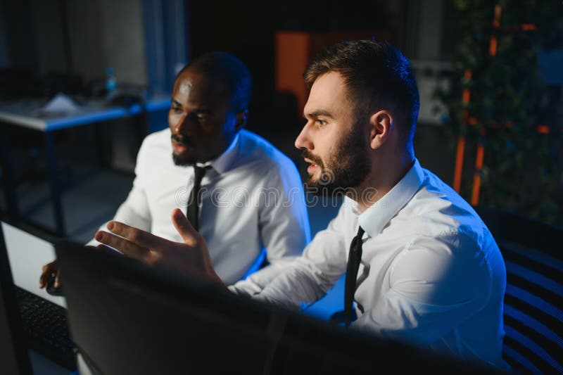 Team of Traders Working with Forex Trading Charts and Graphs on ...