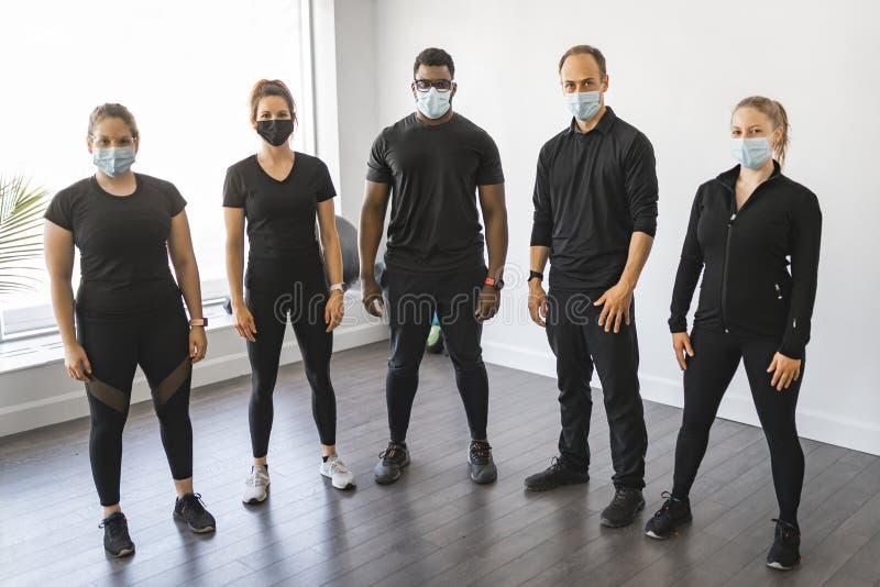 Team of Trainer Standing with a Smile in the Training Gym Stock Image ...