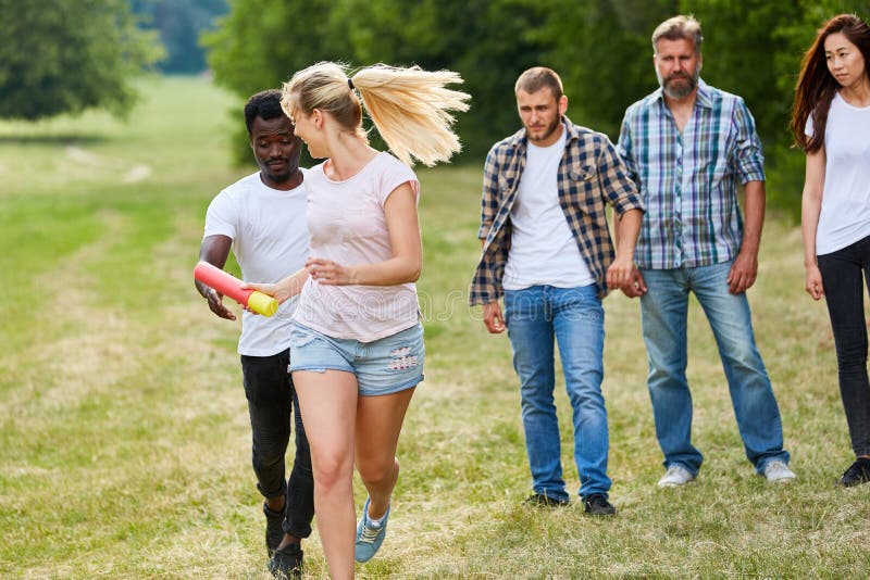 Team Trains Cooperation in the Relay Race Stock Image - Image of relay ...
