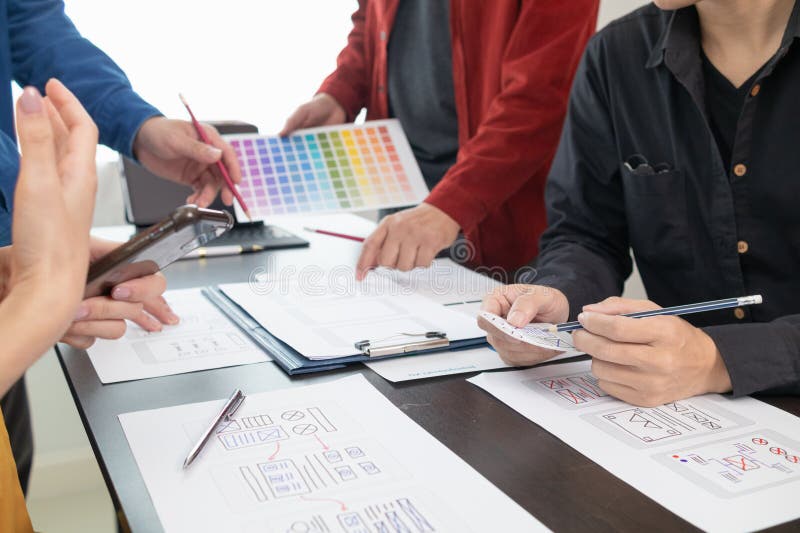 Team of UI UX Web Designer are Working Together To Develop Mobile ... Team of UI UX Web Designer are Working Together To Develop Mobile ...