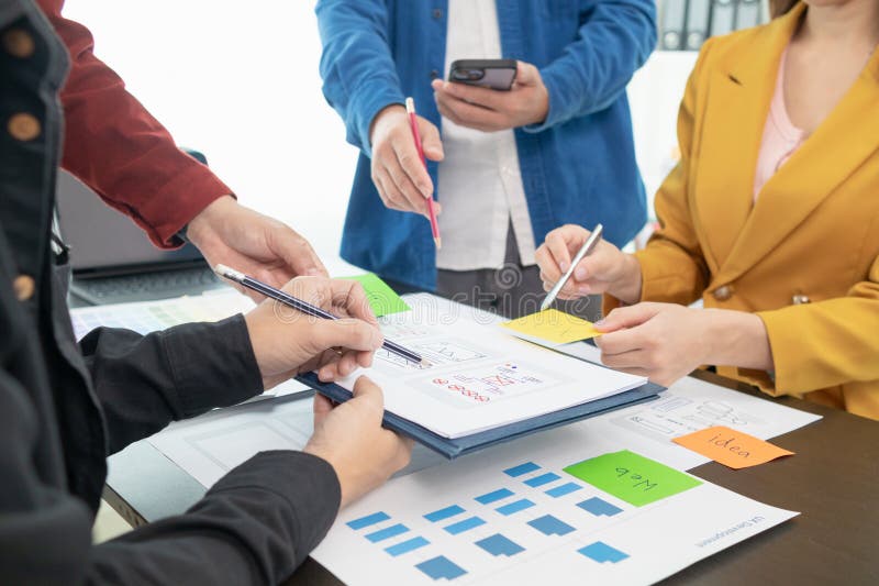 Team of UI UX Web Designer are Working Together To Develop Mobile ... Team of UI UX Web Designer are Working Together To Develop Mobile ...