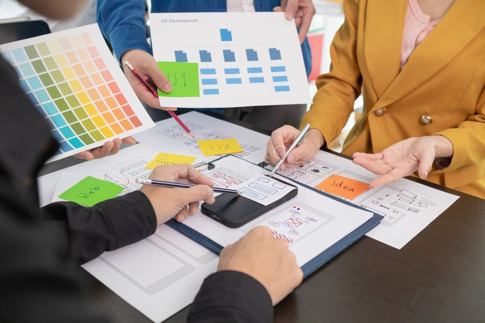 Team of UI UX Web Designer are Working Together To Develop Mobile ...