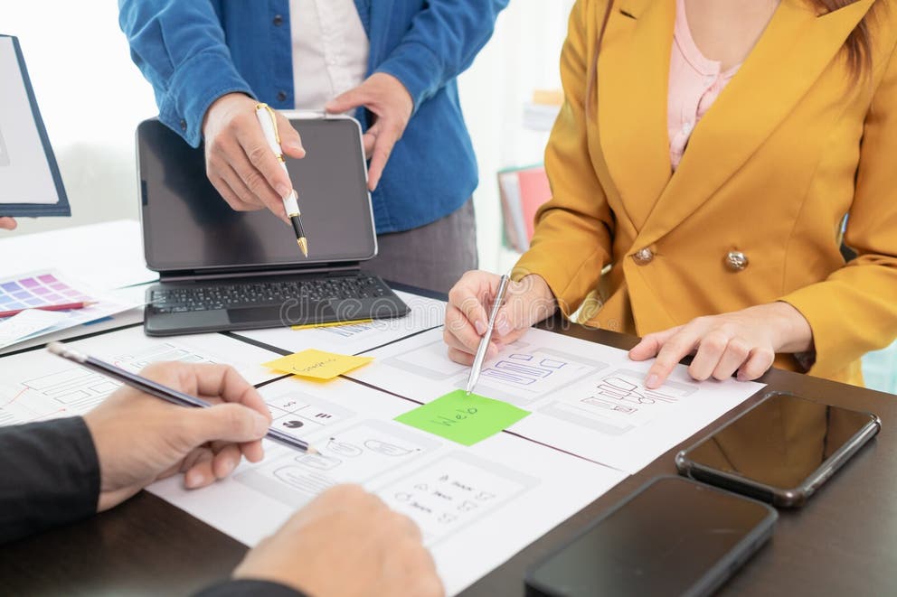 Team of UI UX Web Designer are Working Together To Develop Mobile ...