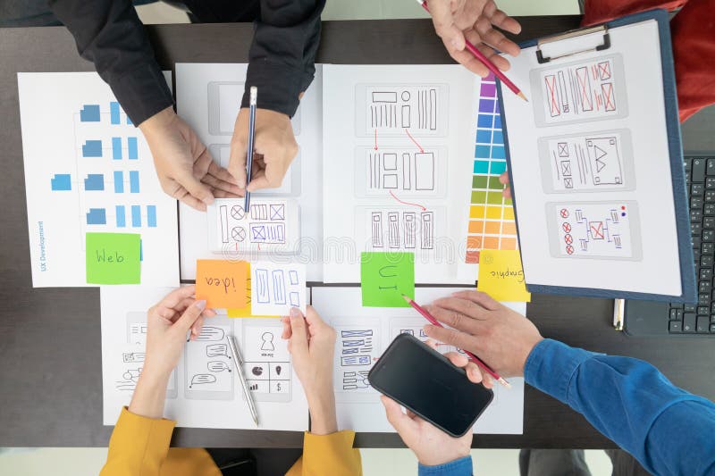 Team of UI UX Web Designer are Working Together To Develop Mobile ...