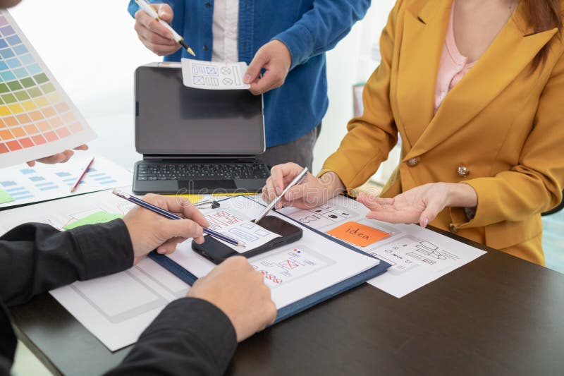 Team of UI UX Web Designer are Working Together To Develop Mobile ...