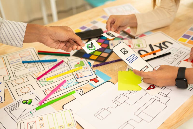 A Team of UI UX Web Designers is Working Together To Develop a Mobile ...