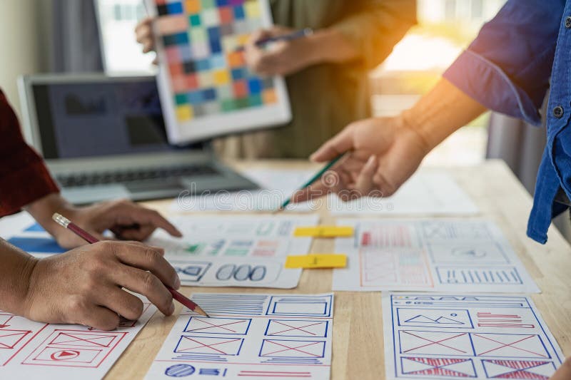 A Team of UI UX Web Designers is Working Together To Develop a Mobile ...