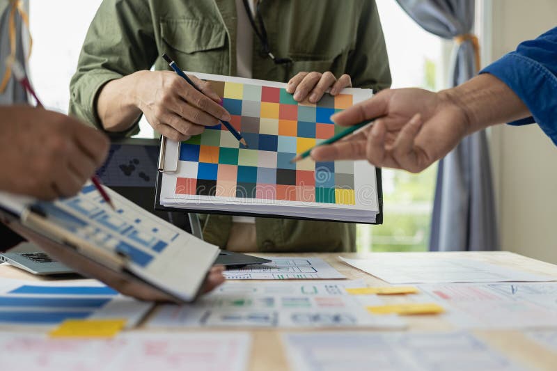 A Team of UI UX Web Designers is Working Together To Develop a Mobile ... A Team of UI UX Web Designers is Working Together To Develop a Mobile ...