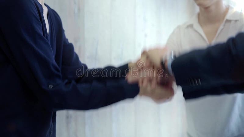 Team Unity - Business Hand Stack. Close-up of a Diverse Team Stacking ...