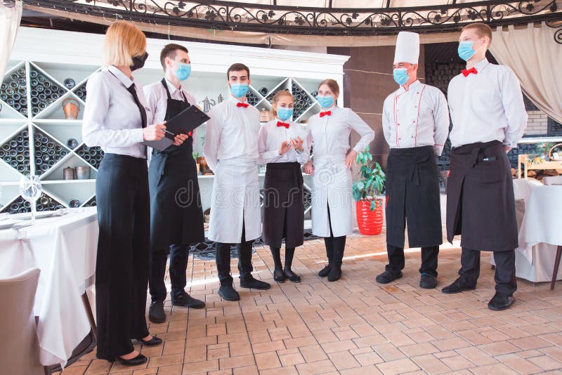 The Waiter Works in a Restaurant. Stock Photo - Image of coronavirus ...