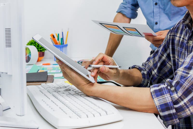 The Team of Website Designers with the Ux Ui System are Writing ...