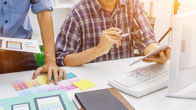 The Team of Website Designers with the Ux Ui System are Writing ...