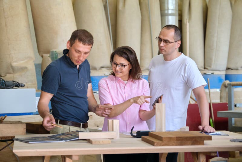 Team of Woodworking Workshop Workers are Discussing Stock Image - Image ...