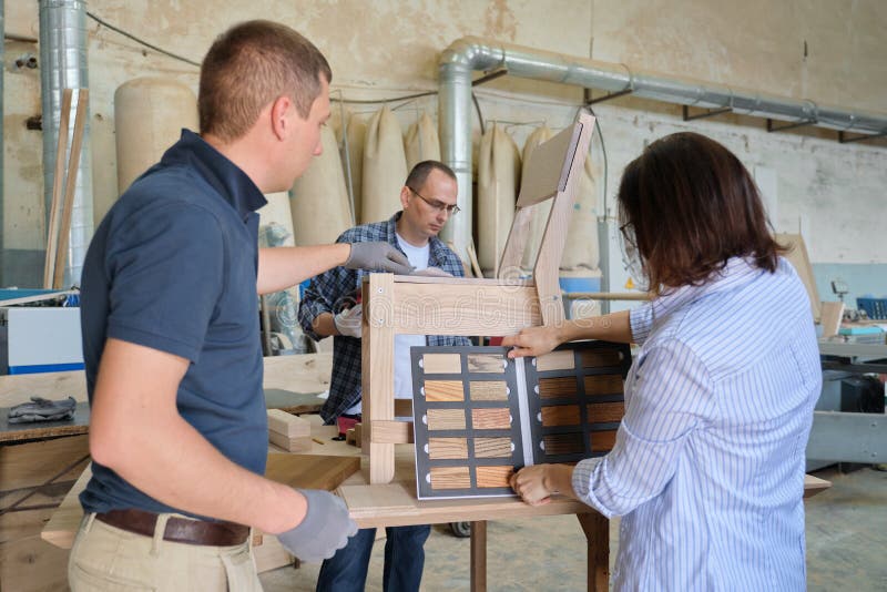 Team of Woodworking Workshop Workers are Discussing Stock Photo - Image ...